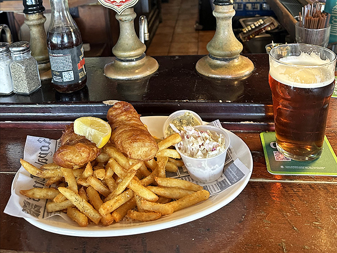 Golden-battered cod with perfectly crisp chips &ndash; not fries, mind you &ndash; ready for a proper dousing of malt vinegar.
