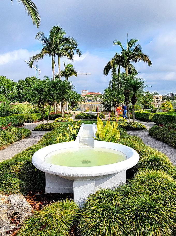 Stroll these pathways flanked by vibrant blooms and you'll forget you're in downtown Lakeland &ndash; until the fountain's gentle music pulls you forward.