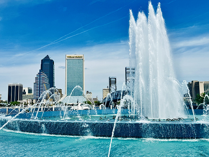 Crystal clear waters dance skyward, creating a refreshing microclimate that's several degrees cooler than the surrounding summer heat.