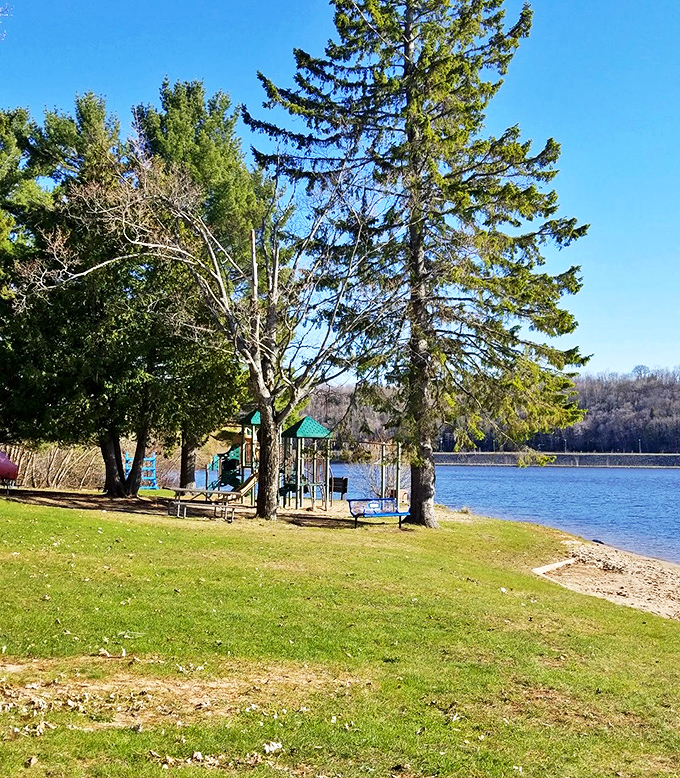 Simple wooden swings facing the beach invite visitors to pause and appreciate Hancock's natural waterfront beauty.