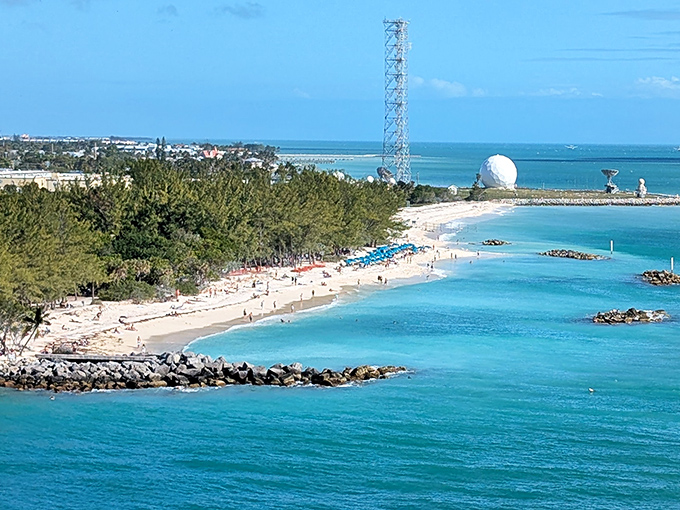 High-angle shot: From above, the park reveals its perfect geometry – a man-made star surrounded by nature's infinite blue canvas.