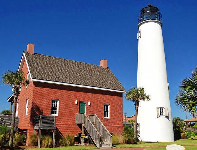 History stands tall beside the gleaming white lighthouse, where the Keeper's House tells tales of maritime adventures and coastal guardianship.