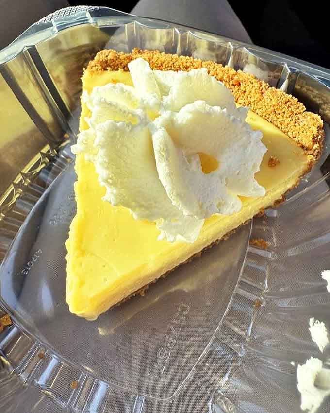 The legendary dessert that locals line up for – perfectly balanced tartness meets buttery graham crust, topped with fresh lime slices.