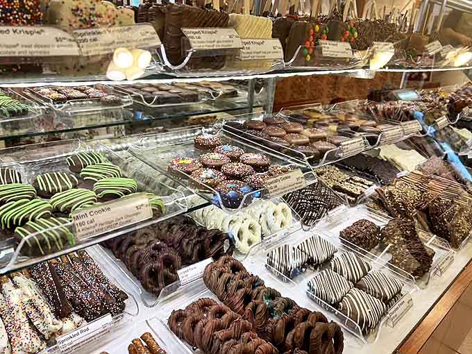 Chocolate-covered everything! Pretzels, cookies, and treats arranged like edible jewelry, each one hand-dipped and decorated with artistic flair.