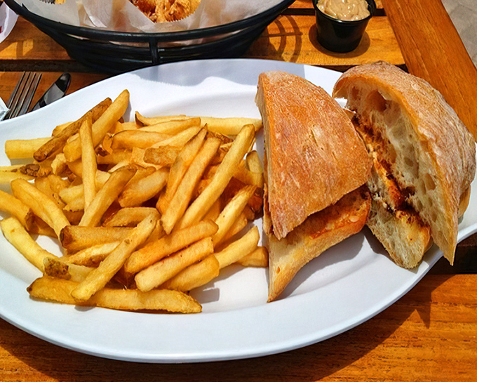 This isn't just lunch; it's a vacation on a plate. Golden fries alongside a perfectly grilled sandwich that tastes like sunshine.