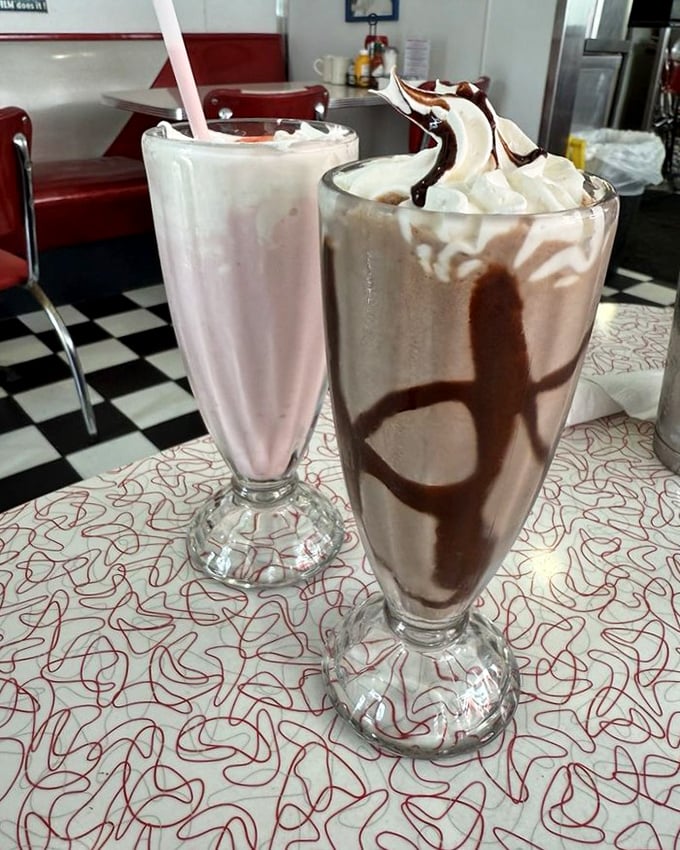 These aren't just milkshakes &ndash; they're frothy masterpieces in glass, where chocolate swirls dance along the sides like edible art.