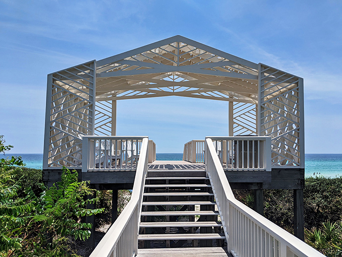 This elegant pavilion offers a shaded sanctuary where conversations flow as freely as the Gulf breeze through its architectural lattice.