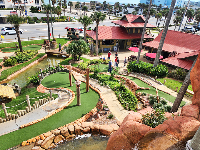Perfectly manicured greens wind through tropical landscapes, challenging golfers to navigate obstacles while soaking in the meticulously crafted jungle atmosphere.