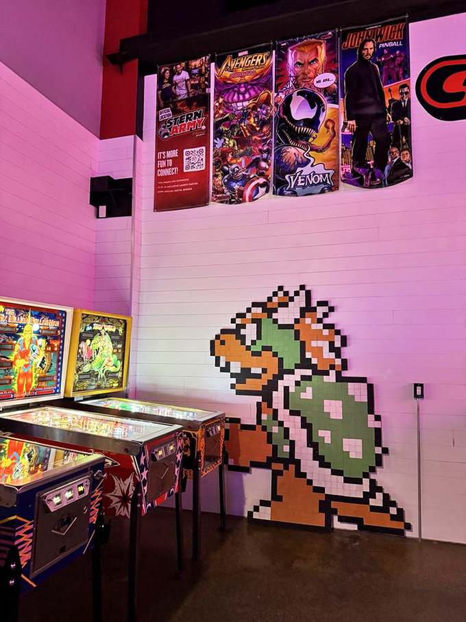 The pinball corner features a pixel-perfect Bowser mural, watching over players as they battle gravity one flipper at a time.
