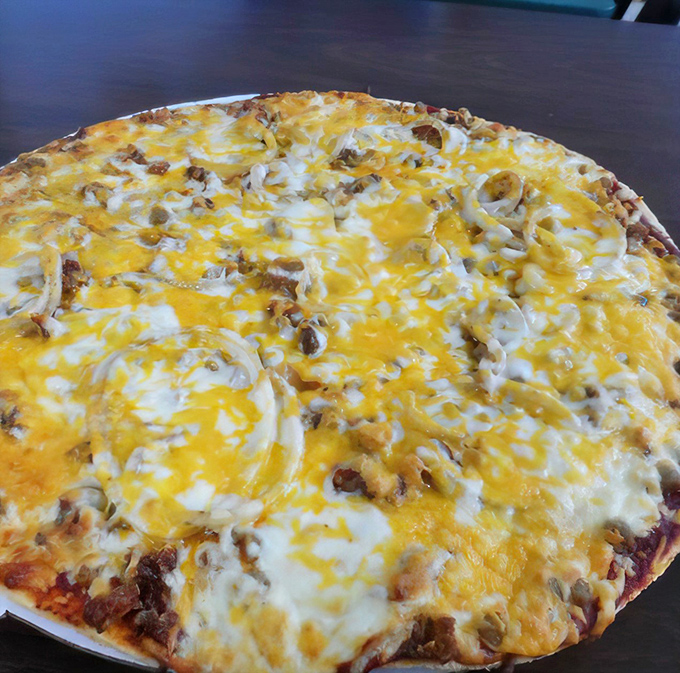 This cheese-laden pizza isn't trying to be artisanal or authentic Italian &ndash; it's aiming straight for your soul's comfort zone and hitting the bullseye.