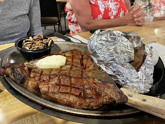 That Porterhouse steak could double as a small shield, arriving at your table with enough beef to satisfy even the heartiest appetite.