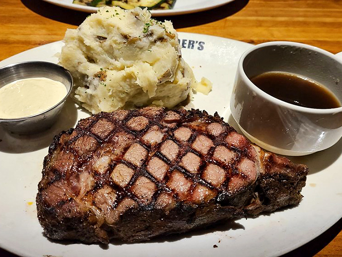 Prime rib perfection &ndash; a masterclass in meat preparation with mashed potatoes so fluffy they practically need their own weather forecast.