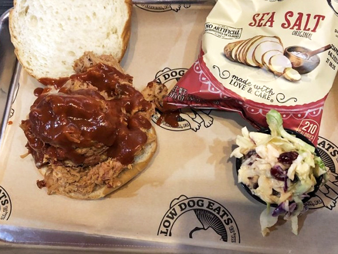 This isn't just a sandwich &ndash; it's architecture in food form, with perfectly smoked pulled pork and tangy sauce creating a masterpiece that demands to be photographed before devouring.