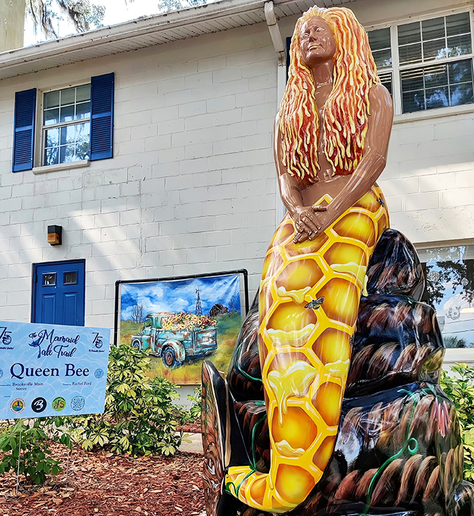 Queen Bee brings honeycomb couture to the waterfront, making every other mermaid's tail look positively under-accessorized by comparison.