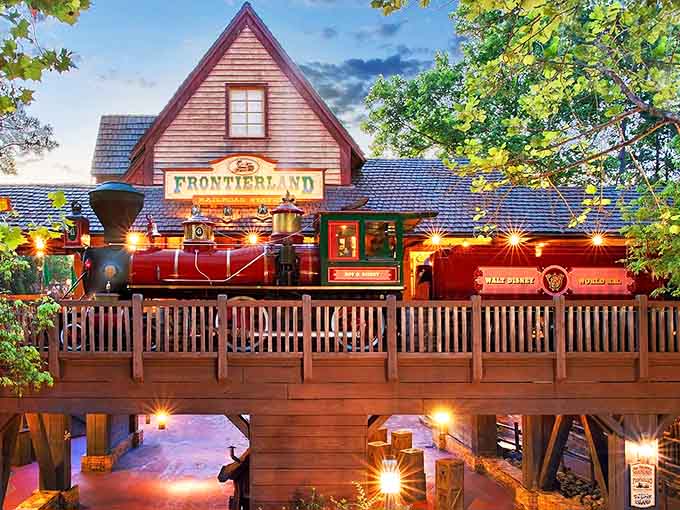 The Frontierland station captures the rustic charm of the American West, complete with wooden beams and that unmistakable frontier aesthetic.