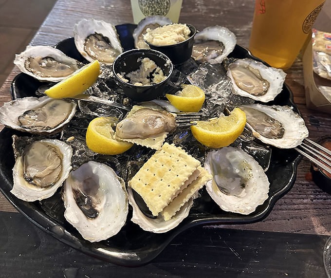 Fresh oysters on the half shell &ndash; nature's perfect appetizer, served with lemon wedges and tiny crackers that somehow taste better here.