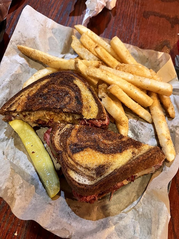 The legendary Reuben in all its glory &ndash; perfectly grilled marble rye, tender corned beef, melted Swiss, and just the right amount of sauerkraut and dressing.