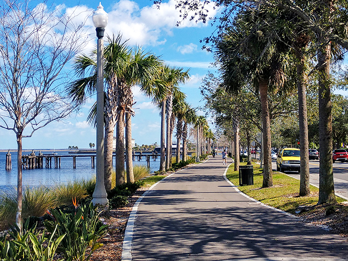 Palm-lined perfection along Sanford's Riverwalk offers a peaceful respite where Lake Monroe's waters whisper stories of Old Florida.