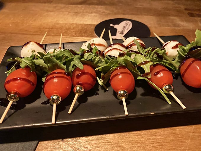 These aren't your average appetizers &ndash; mozzarella and tomato skewers get the gourmet treatment with fresh basil and a balsamic drizzle.