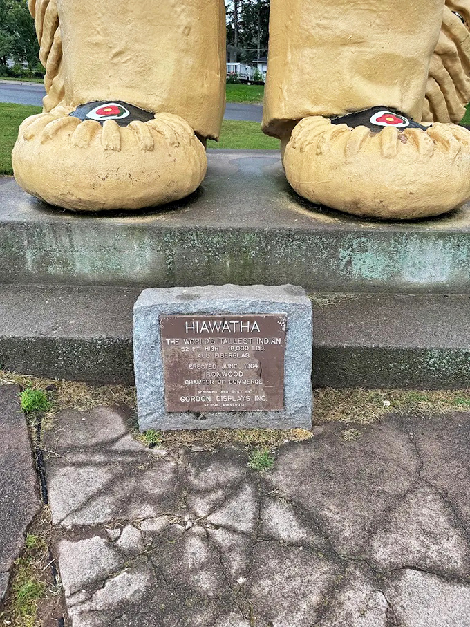 A plaque at the base proudly declares this as "The World's Tallest Indian," a title from another era that connects visitors to mid-century roadside Americana.