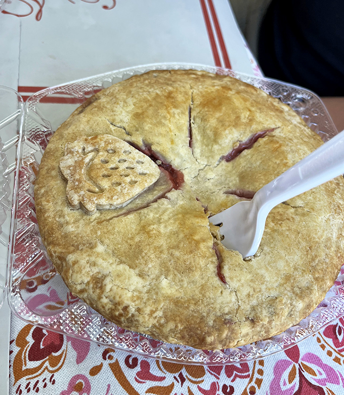The crown jewel of Pie Heaven &ndash; perfectly balanced sweet strawberries and tart rhubarb nestled in a golden, flaky crust.