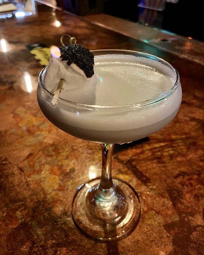 This ghostly white cocktail comes garnished with a black boba pearl that pops delightfully in your mouth – a potion worthy of any witch's cauldron.