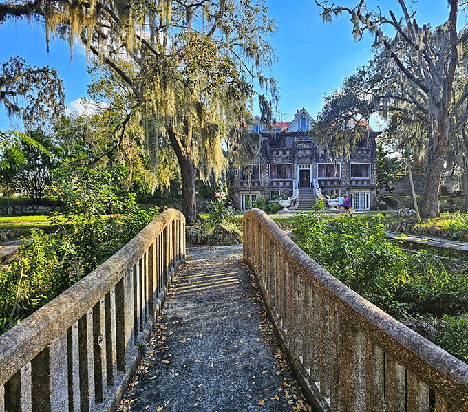 Approaching via the weathered bridge feels like crossing into another dimension, one where architectural rules were more like friendly suggestions.