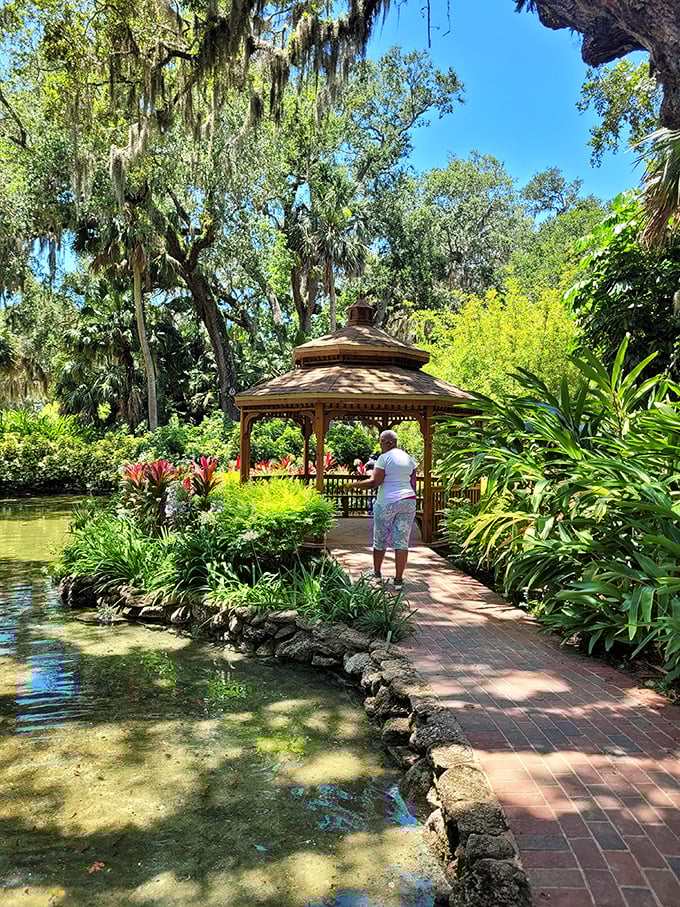 Peaceful contemplation awaits in the wooden gazebo, where visitors can absorb the garden's beauty while listening to nature's symphony.