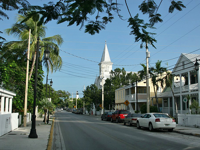 Whitehead Street's charming architecture and church spire create the perfect backdrop for a post-dinner stroll through Key West's historic district.