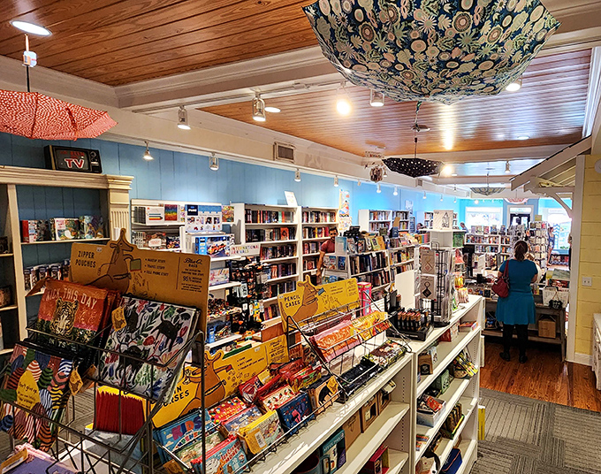 The shop's thoughtful layout invites exploration without overwhelming, creating intimate browsing spaces where literary treasures await discovery around every corner.