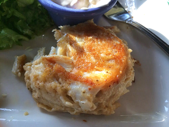 Golden-brown perfection that's more crab than cake &ndash; this is what happens when seafood is treated with the respect it deserves.