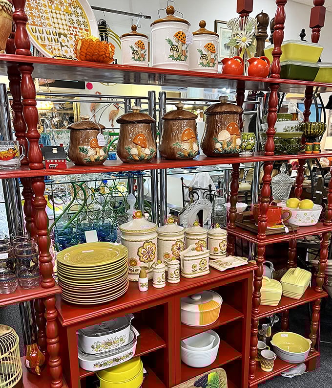 Mushroom canisters and harvest gold cookware stand at attention, ready to trigger flashbacks of childhood kitchens and grandma's Sunday dinners.