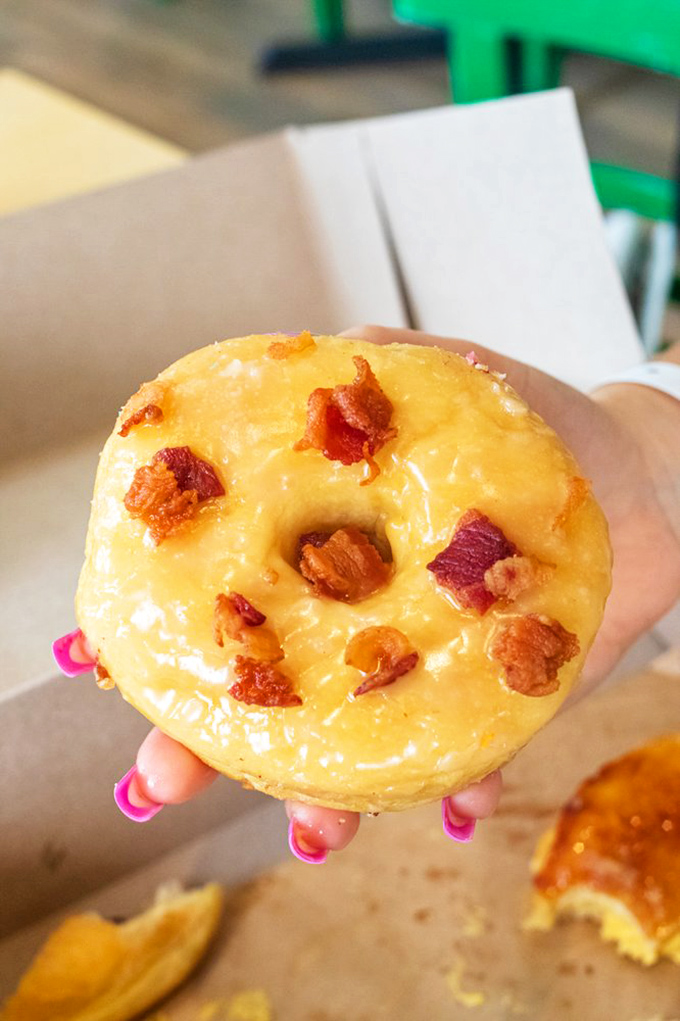 The celebrity of the menu &ndash; golden glaze catching the light, crispy bacon bits adding that perfect savory counterpoint.