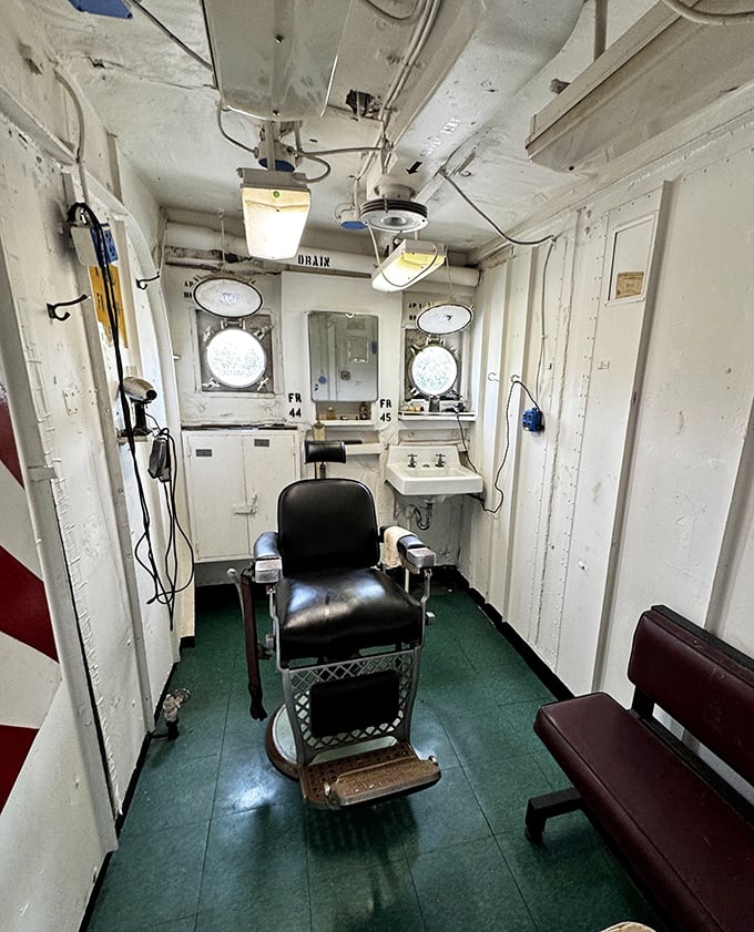 Not your average barbershop! The ship's compact grooming station shows how sailors maintained military standards while miles from shore.