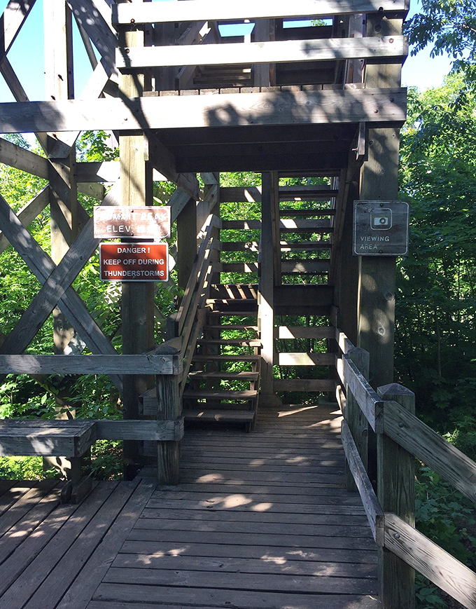 The viewing platform stands like nature's theater box, offering front-row seats to a performance that's been running for about a billion years.