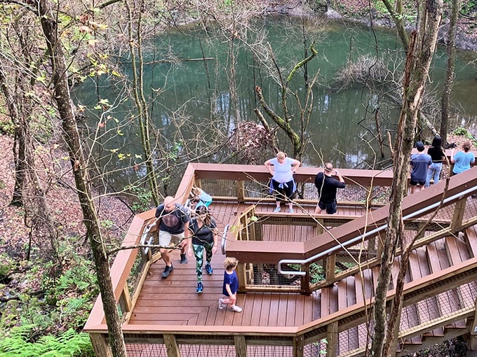 Visitors gather on observation decks, collectively thinking "so THIS is what it feels like to stand inside Earth's belly button."