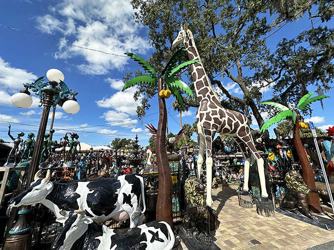 Metal giraffes and colorful sculptures create a safari of imagination at Barberville's eclectic outdoor art market.