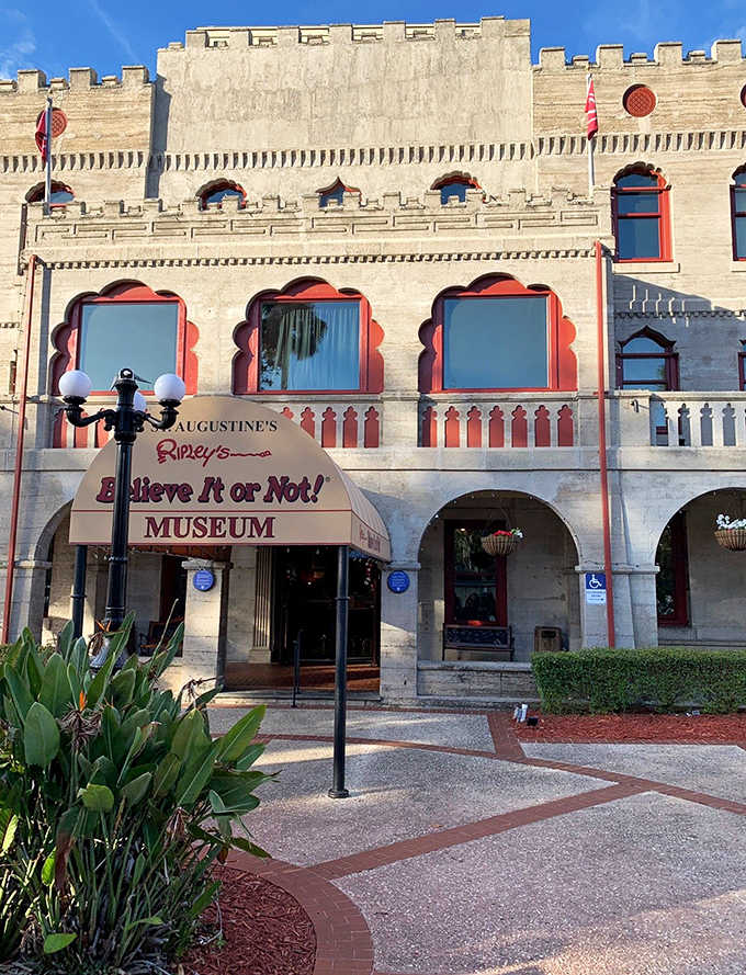 The red and white arches give this castle-like building a carnival atmosphere perfect for oddities and wonders.