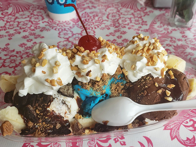 Pinkie's banana split extravaganza – a mountain of ice cream, whipped cream, and toppings that requires both a spoon and a strategy to conquer.