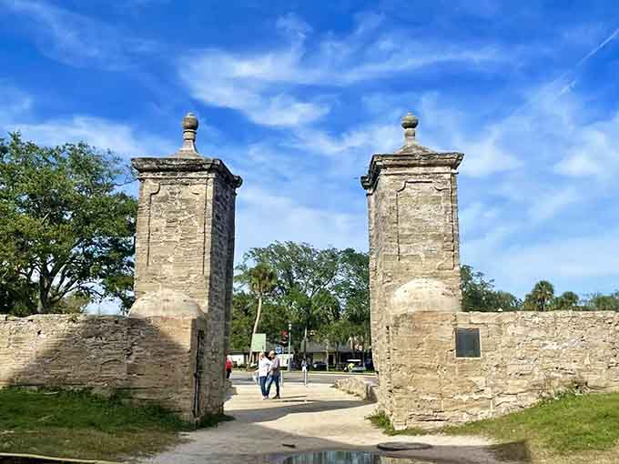 The City Gate pillars frame your entrance to history, standing guard like patient stone sentries.