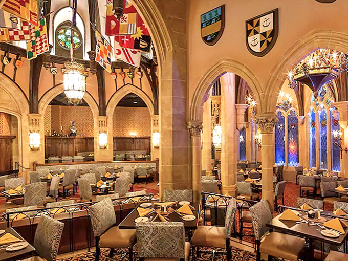 Dining beneath stained glass windows and ornate arches makes every meal feel like a royal feast. The castle's interior architecture is as impressive as its famous exterior.