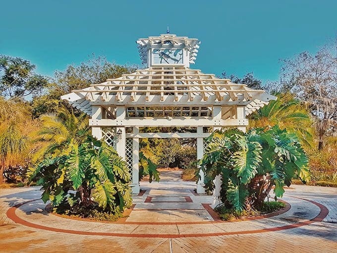This elegant white gazebo surrounded by palms offers the perfect spot to pause and soak in tropical tranquility.