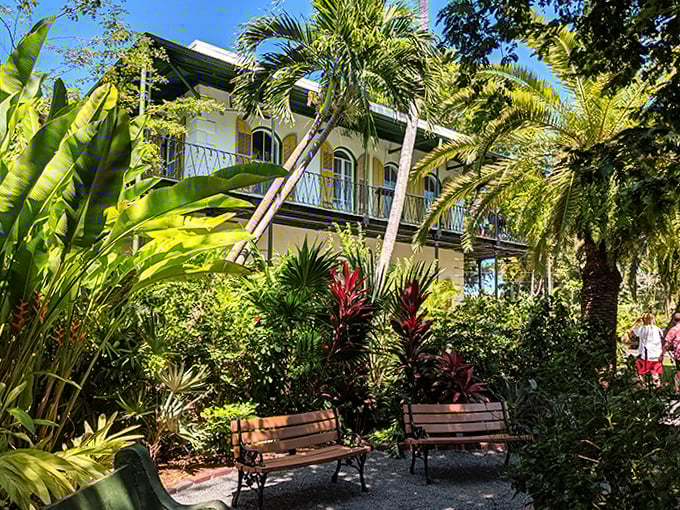 The Hemingway Home's colonial charm captures Key West's tropical elegance, a literary landmark surrounded by lush gardens.