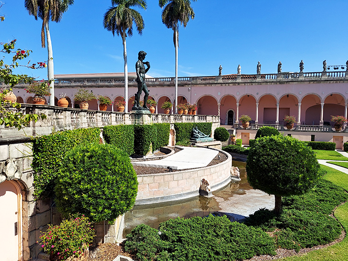 Perfectly manicured gardens frame classical statues, creating an unexpected piece of European elegance on Florida's Gulf Coast.