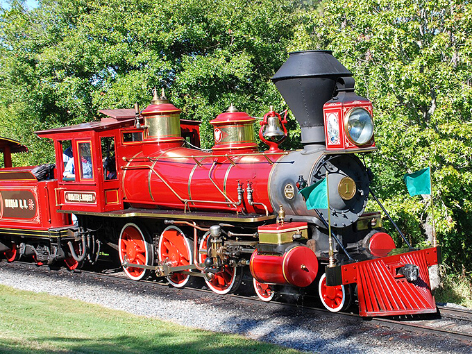 The classic red and green locomotive brings Walt Disney's railroad passion to life, circling the Magic Kingdom in grand style.