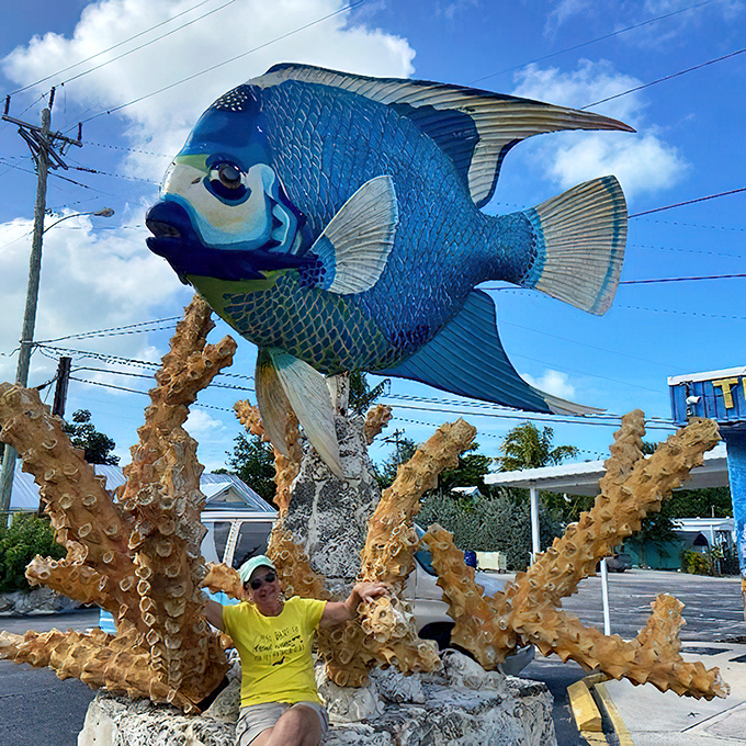 Visitors can't help but smile beneath this benevolent blue monarch – it's impossible to keep a straight face with such delightful absurdity.