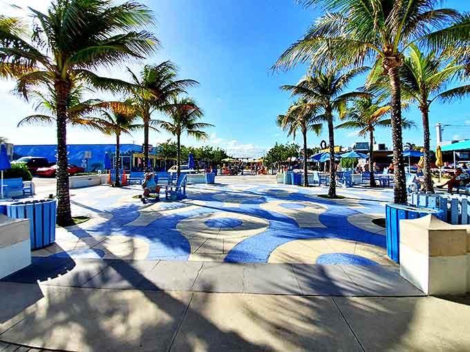 Anglin's Square buzzes with pedestrian energy, where flip-flops are formal wear and every bench tells a thousand sunset stories.
