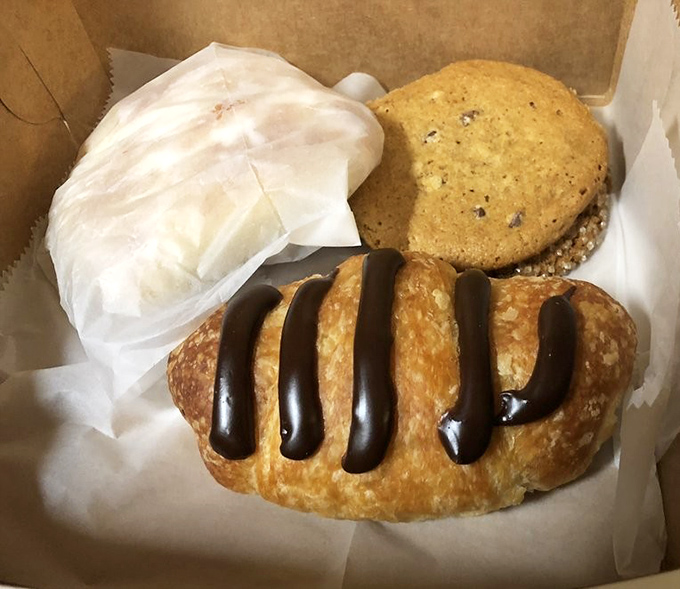 Assorted Pastries: The pastry box that makes car dashboards into dining tables and turns "I'll save some for later" into history's least believable lie.