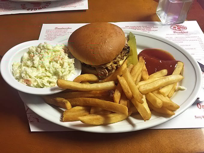 A perfect balance of tender meat, tangy sauce, and simple bun &ndash; barbecue architecture at its finest, with coleslaw and fries as worthy sidekicks.