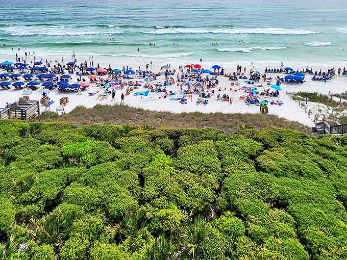 From above, beachgoers look like happy little dots enjoying nature's perfect swimming pool &ndash; that impossible blue-green water is no camera trick!
